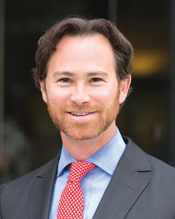 D. Karp named president of New England Development : NEREJ